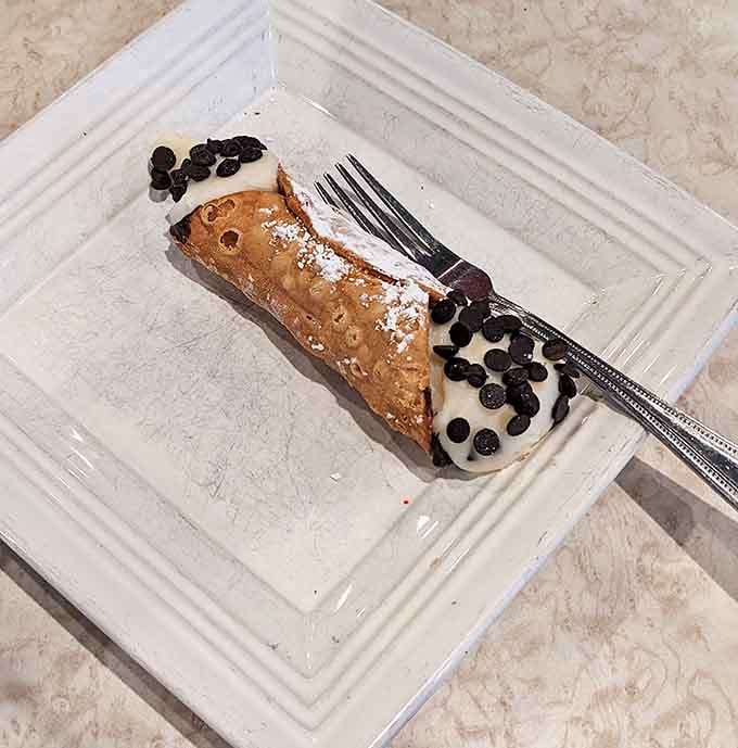 The cannoli &ndash; Sicily's gift to the world &ndash; presented with just enough chocolate chips to make you feel like you've made excellent life choices.