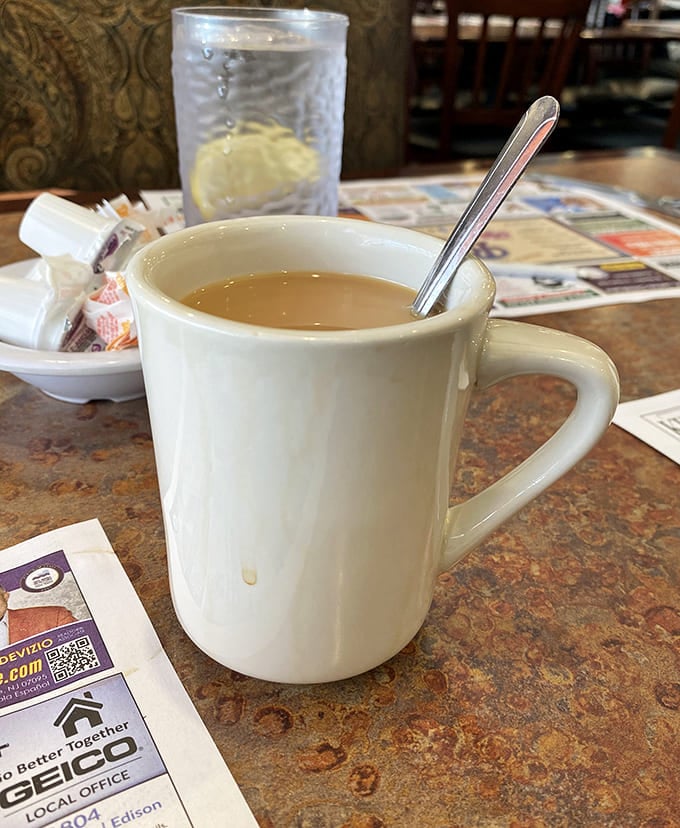 The humble diner coffee mug&mdash;civilization's most perfect vessel. This isn't just caffeine; it's liquid motivation served in ceramic armor for morning battles.
