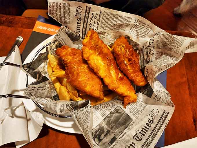 Fish and chips wrapped in newspaper – old-school presentation for golden-battered goodness. The kind of comfort food that transcends borders.
