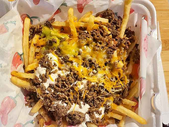 Loaded fries: where American comfort food meets Mexican flavor in a cross-cultural romance that feels both rebellious and absolutely right.