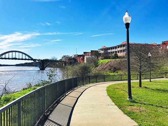 Selma's riverfront walking path offers the perfect blend of exercise and scenery. That bridge silhouette against the sky is worth every step.