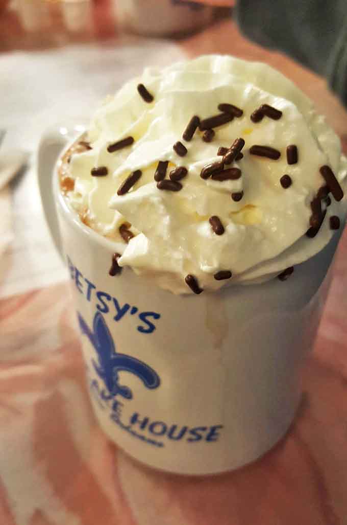 Hot chocolate that's dressed for success with whipped cream and chocolate sprinkles&mdash;comfort in a mug that makes you five years old again.