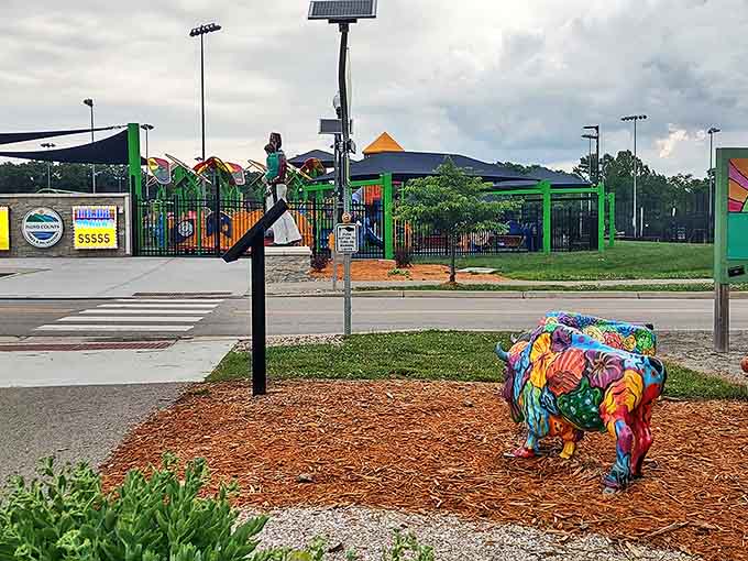Kevin Hammersmith Memorial Park's vibrant playground and whimsical buffalo sculpture remind us that the best community spaces blend function with unexpected delight.