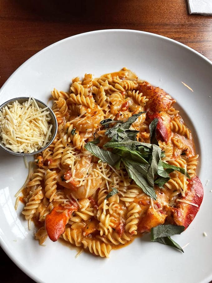 Pasta perfection with a seafood twist&mdash;this fusilli dish brings together tomatoes, herbs, and ocean treasures in a bowl that screams "comfort food with a college degree."