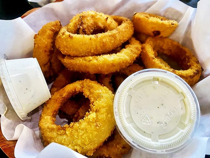 Golden halos of crispy, perfectly-fried onion rings that make you wonder why vegetables ever bothered growing any other way.