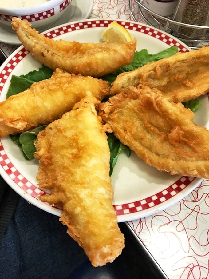 Lake perch so perfectly fried, it makes you wonder if Wisconsin's proximity to the Great Lakes was divine breakfast intervention.