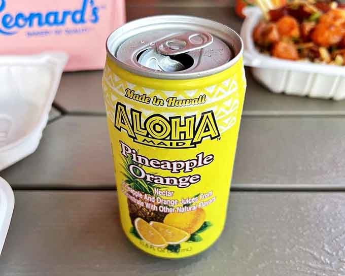 Nothing complements fresh poke like a cold Aloha Pineapple Orange&mdash;Hawaii's answer to champagne when you're sitting on a beach with takeout paradise.