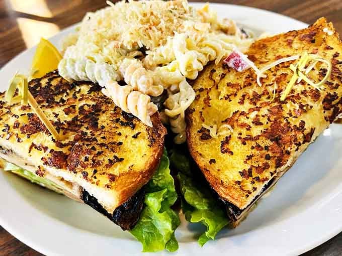 This grilled sandwich with pasta salad proves that lunch at PJ's is serious business, with melty cheese as the CEO.