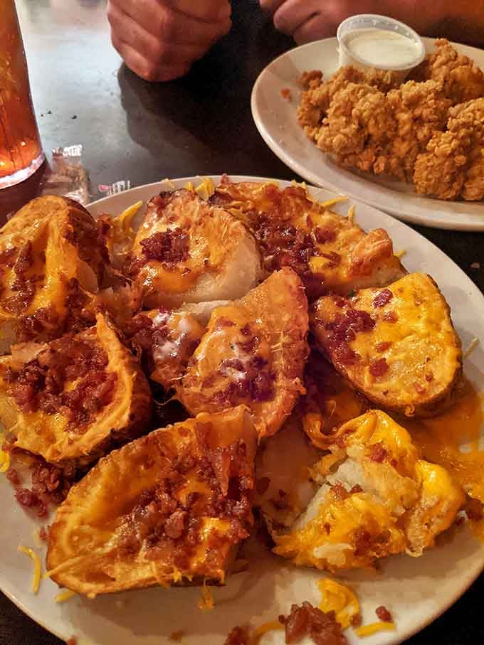 Potato skins that have achieved the impossible trifecta: crispy, gooey, and bacon-y. The appetizer equivalent of winning the lottery.