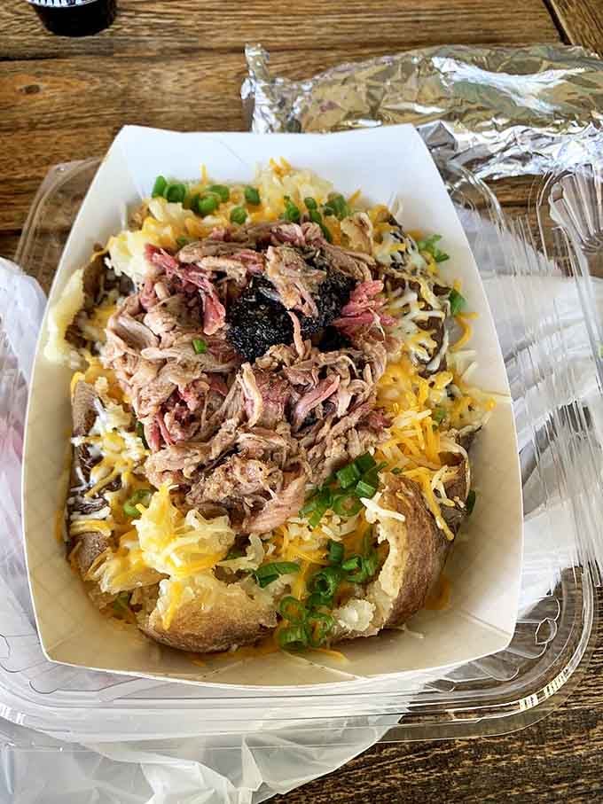 Not just any loaded potato&mdash;this is a BBQ delivery system disguised as a spud. The perfect marriage of comfort food and smokehouse magic.