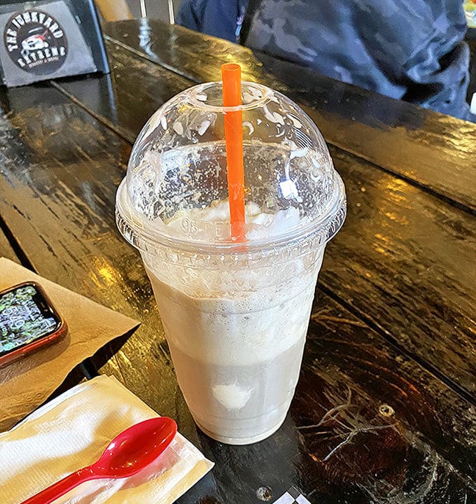 The root beer float arrives like a childhood memory in a cup &ndash; creamy, fizzy nostalgia that pairs perfectly with those monster burgers.