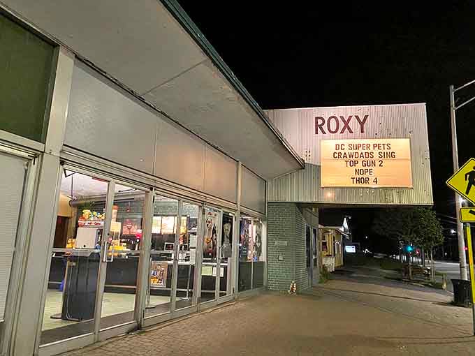 The Roxy Theater marquee glows with current films, proving small-town living doesn't mean missing blockbusters. Date night possibilities abound!