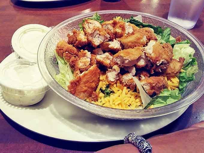 Salad gets the Southern treatment with crispy fried chicken proving that "healthy option" is a relative term in these parts.