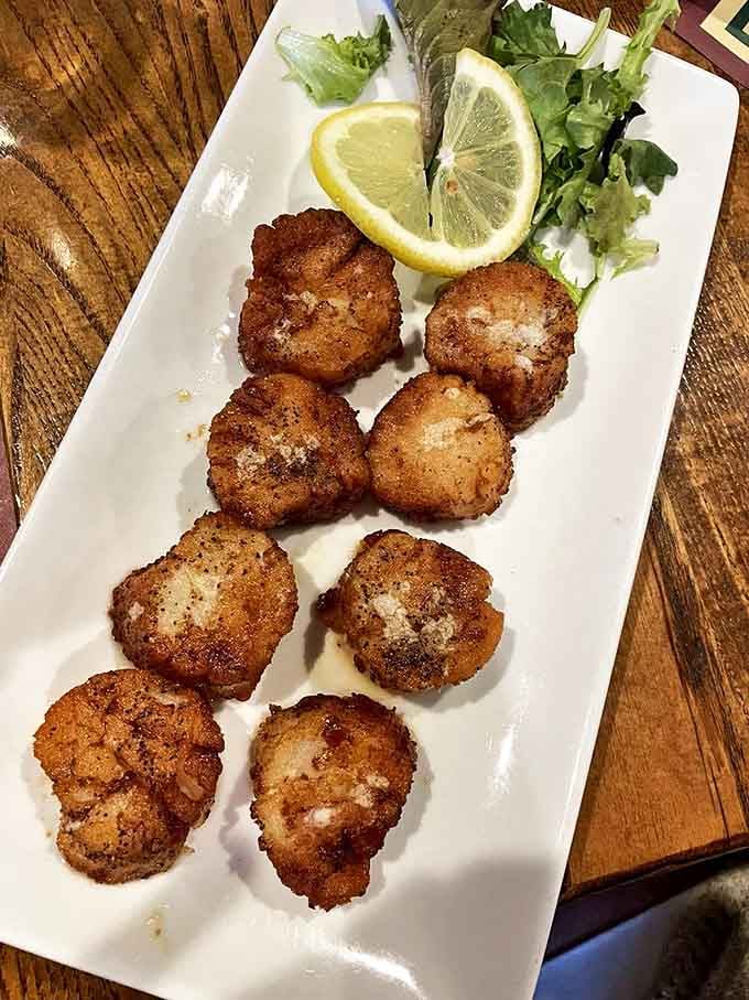 Golden-brown scallops that snap like nature's candy—the ocean's perfect gift, transformed by a hot pan and respect for tradition.