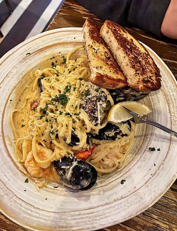 Seafood linguine that would make an Italian grandmother nod in approval&mdash;perfectly al dente pasta swimming in company you'd be happy to keep.