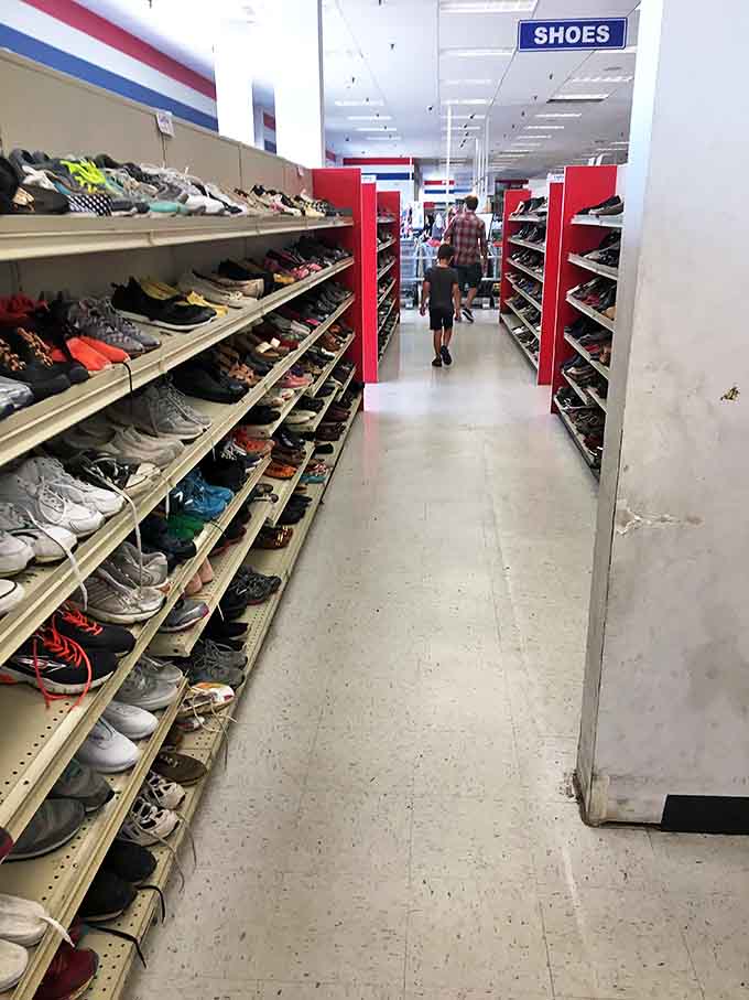 Shoe heaven stretches before you. Somewhere in this aisle is a pair of barely-worn Nikes just waiting for their second chance.