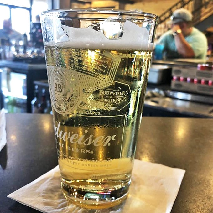 A perfectly poured beer catches the light like liquid gold&mdash;the ideal companion for navigating a menu of Louisiana treasures.