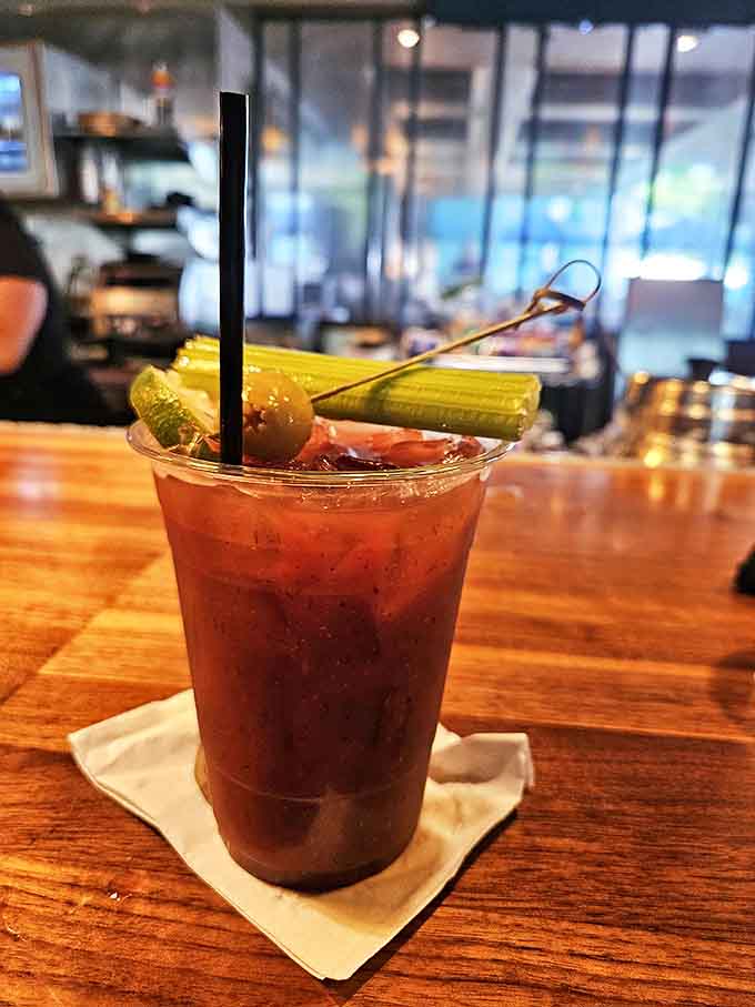 A Bloody Mary so loaded it counts as both cocktail and appetizer – the vegetable garnishes practically qualify as your day's roughage requirements.