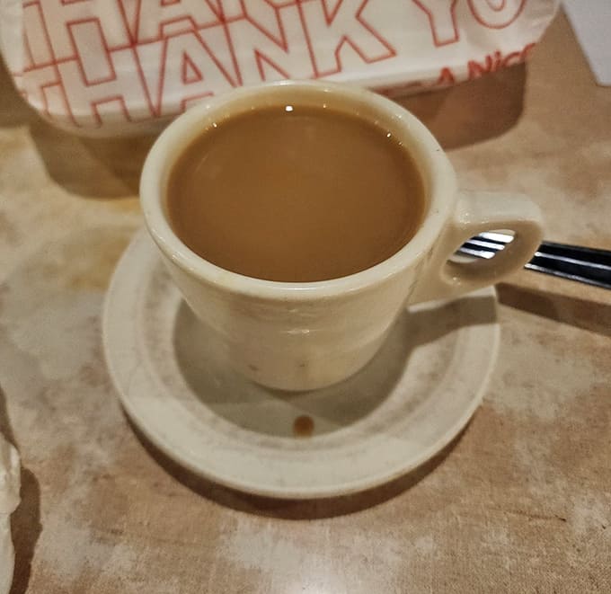 The humble coffee mug &ndash; unassuming vessel of liquid motivation that keeps conversations flowing and Minnesota winters at bay. Refills are practically guaranteed.