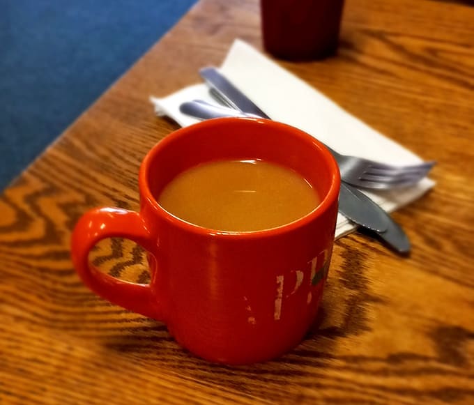 That perfect diner coffee moment: strong enough to wake you up, served in a mug that feels like an old friend.