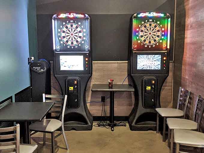 The electronic dart area isn't just for games&mdash;it's where friendly rivalries are born and burger-fueled comebacks are plotted with strategic precision.