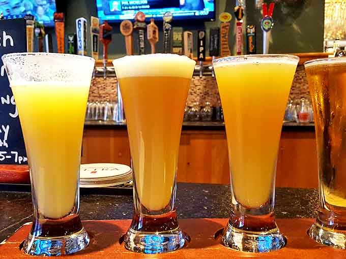 Cold craft beers lined up like liquid sunshine, ready to complement whatever seafood treasure you've chosen from the menu.