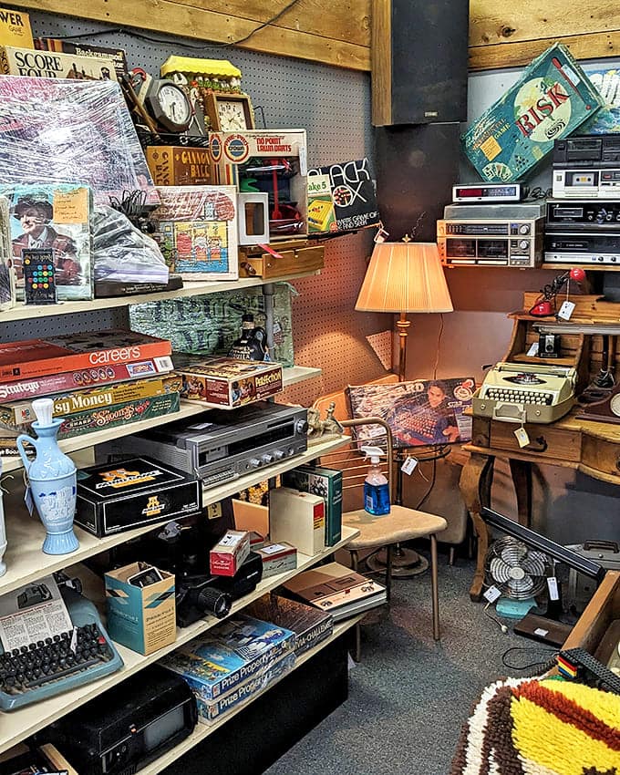 Technology graveyard or analog paradise? Those vintage typewriters and board games remind us when entertainment required more than thumbs.