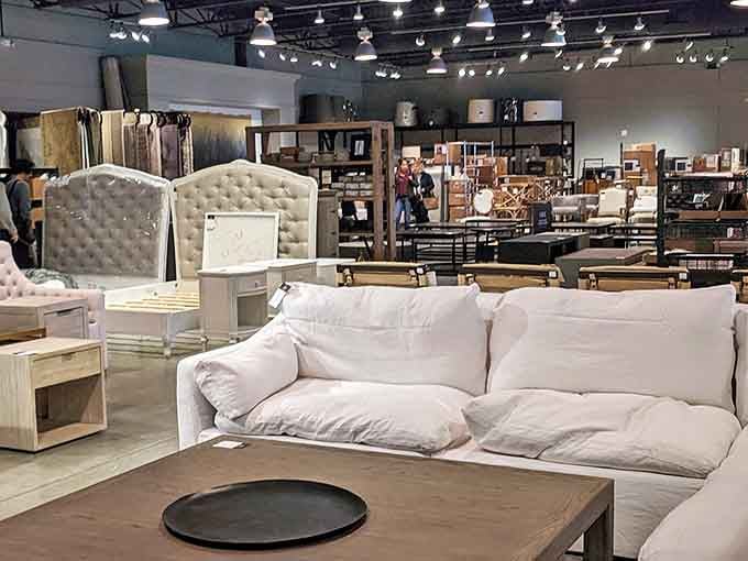 Furniture that whispers, "Your living room could look this good." That white couch is practically begging to transform your Netflix binge spot.