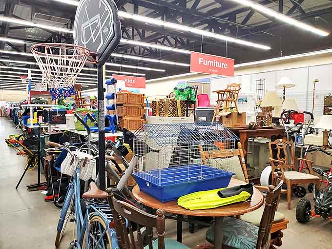 The furniture section resembles a living room time machine. That round oak table has seen more family dinners than most of us have had birthdays.