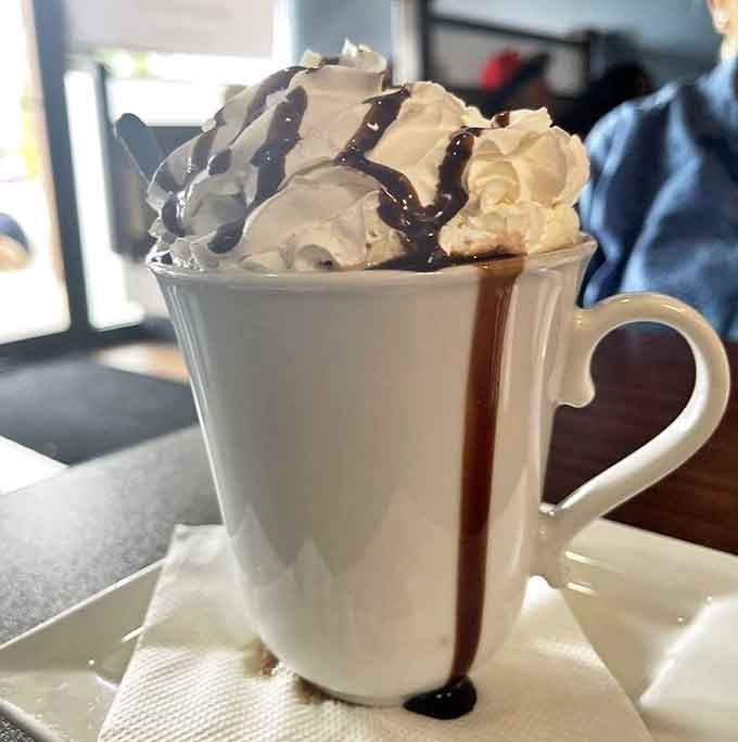 This isn't just hot chocolate&mdash;it's a mug of liquid comfort topped with enough whipped cream to qualify as its own food group.