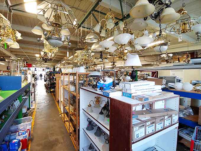 Chandelier heaven! More hanging lights than a disco ball factory, each one waiting to illuminate someone's dining room drama.