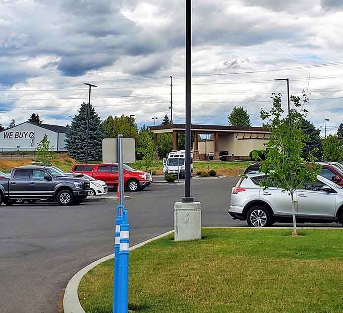 The spacious parking area accommodates the steady stream of donation-droppers and deal-finders who keep this community hub thriving.