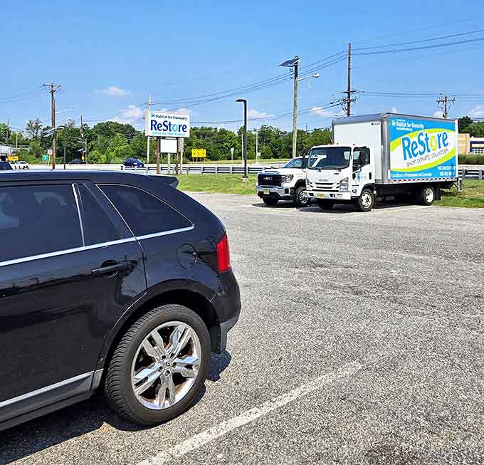 Even the parking lot buzzes with activity as the ReStore truck returns from collecting new donations that will soon find happy homes.