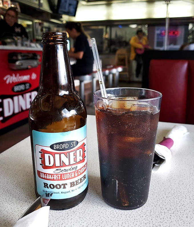 Their house-branded root beer comes in bottles that belong in a time capsule. Paired with that classic diner glass, it's liquid nostalgia.