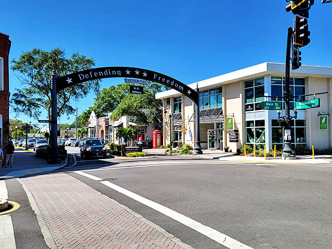 The "Defending Freedom" arch welcomes visitors to Dunedin's charming downtown, where Scottish heritage meets Florida sunshine.