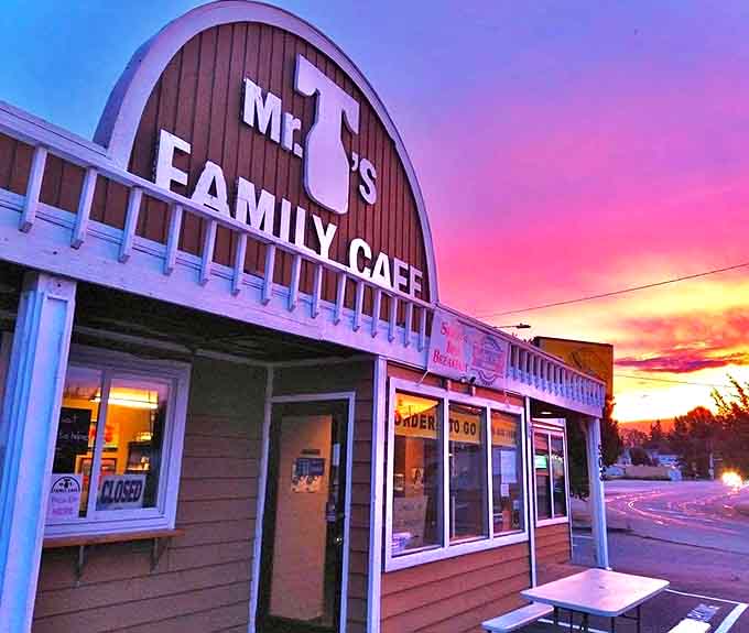 Mr. T's distinctive curved roof creates a welcoming silhouette against a spectacular Washington sunset that rivals the beauty of their pies.