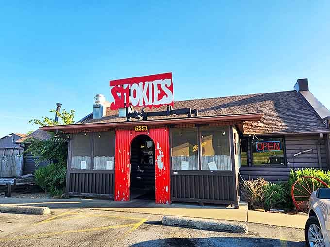 Smokies' rustic cabin vibes and bold red entrance say "come on in" to a world where hickory smoke is practically a religion.