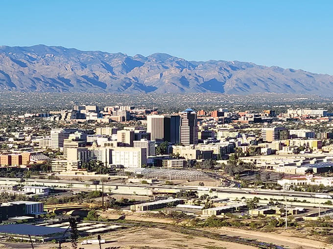 Tucson's downtown skyline stretches toward the beautiful Catalina Mountains, offering big-city amenities at surprisingly affordable prices for residents.