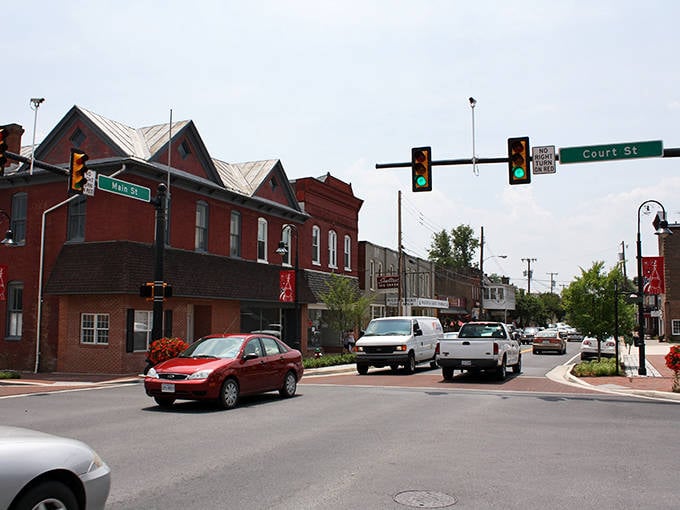 Woodstock's charming downtown showcases historic brick buildings and tree-lined streets perfect for a leisurely afternoon stroll through town.