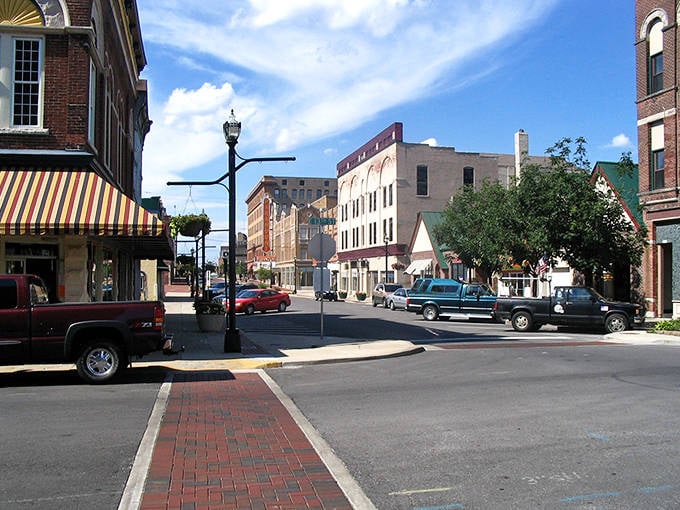 Historic brick buildings line Anderson's charming downtown streets where local businesses create a welcoming small-town shopping atmosphere.