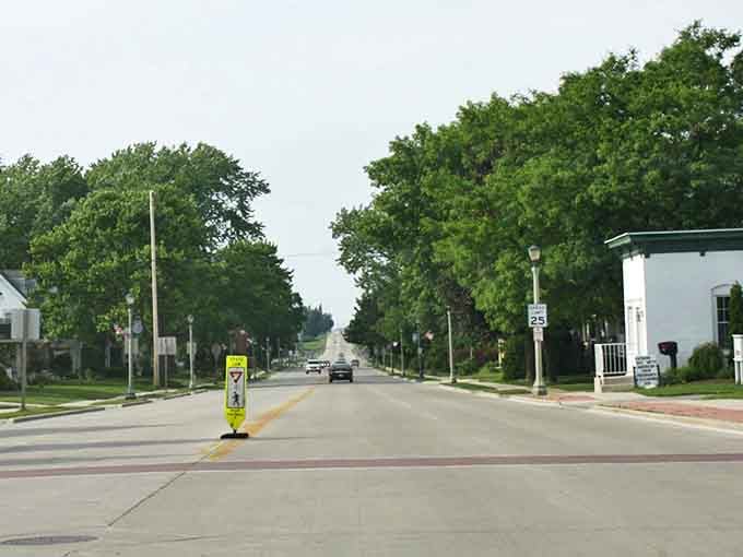 Tree-lined streets in Chilton create nature's canopy over this affordable retirement haven, where every dollar works harder.