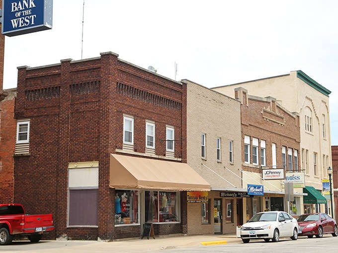 Strolling through Monticello feels like stepping into a time capsule, where classic storefronts and American flags create a quintessential small-town tableau.