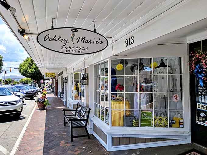 Ashley Marie's Boutique epitomizes small-town shopping bliss with its classic bay window display and welcoming bench that practically whispers, "Stay awhile."