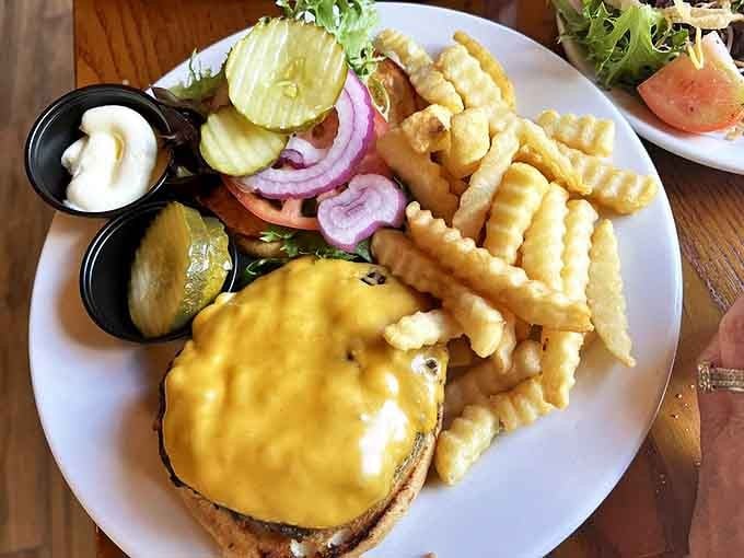 This isn't just a burger &ndash; it's a masterclass in comfort food architecture, where every layer contributes to the perfect bite.