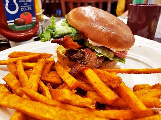 A burger that doesn't need gimmicks, just honest beef and fresh toppings, with fries that achieve that perfect golden-crisp exterior and fluffy interior.