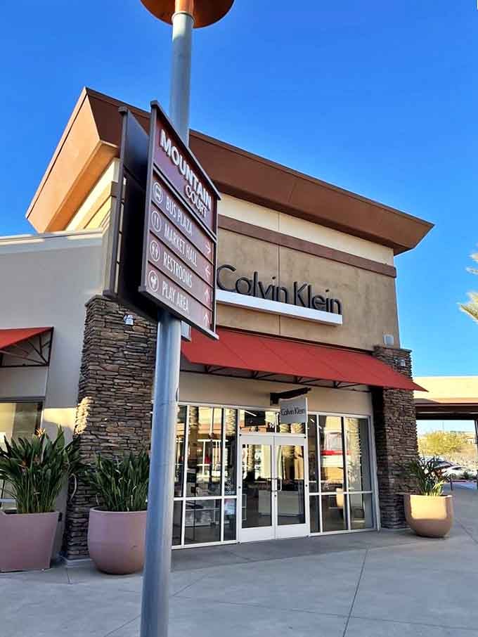 Calvin Klein's clean, modern storefront promises classic American style without the Manhattan price tag&mdash;a cornerstone of the outlet experience.