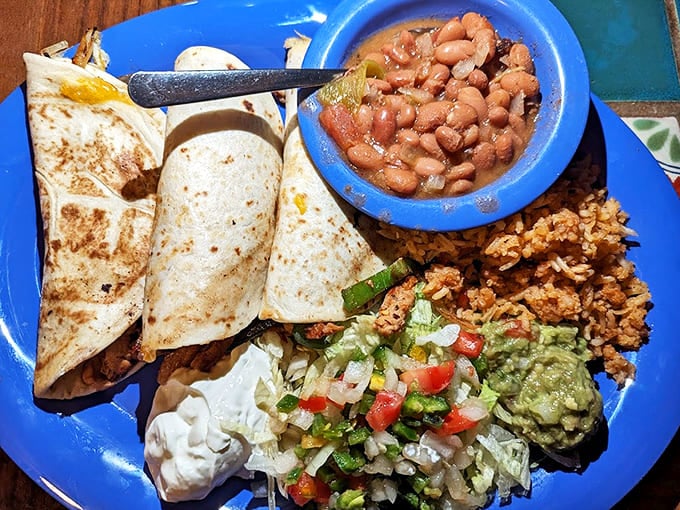 A blue plate special that's anything but ordinary. These tacos arrive with an entourage of rice, beans, and enough toppings to make a salad bar jealous.