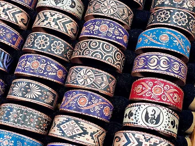 Leather and metal unite in these handcrafted cuff bracelets. Each geometric pattern and floral design represents someone's artistic vision and skilled hands.