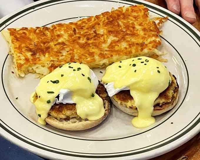 Crab cake benedict: where Maryland's seafood pride meets breakfast royalty, crowned with hollandaise that cascades like yellow velvet.