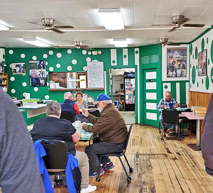 The morning congregation at Traci's&mdash;locals solving world problems over coffee while the green polka-dot walls bear silent witness to decades of conversations.